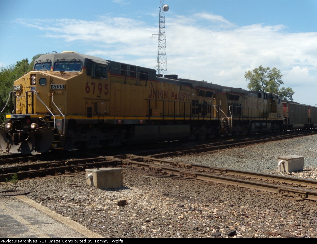 UP 6795 leads a loaded coal train eastbound as it crosses the Dimond